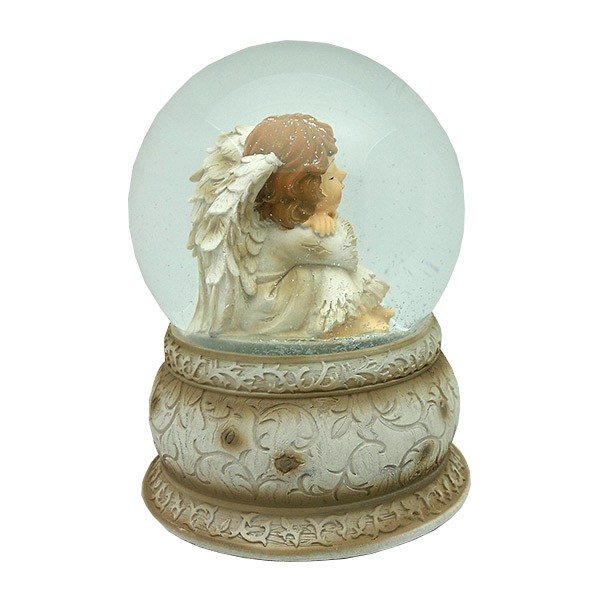 Snow globe with a pretty cherub