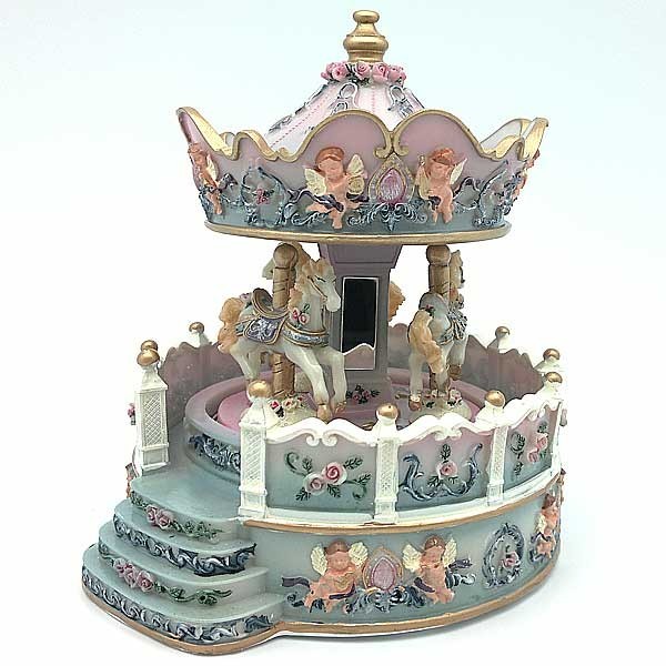 Carousel musical miniature carousel horses.